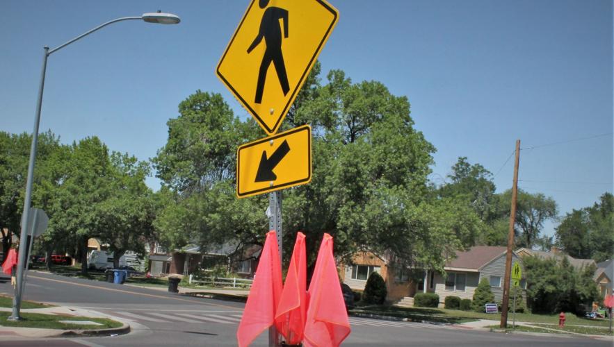 New crossing flags prove to be an inexpensive way to fix crosswalk ...