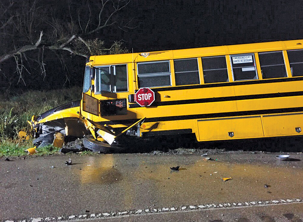Driver suffers life-threatening injuries in head-on crash with school bus