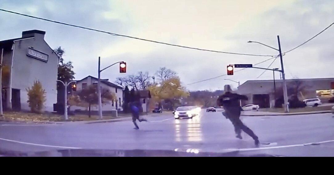 Dashcam video catches police foot chase in Cambridge