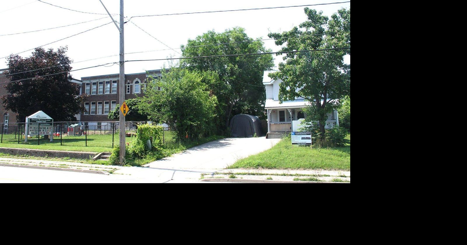 WHAT’S GOING ON HERE? 82 and 88 Beverly St., in Cambridge