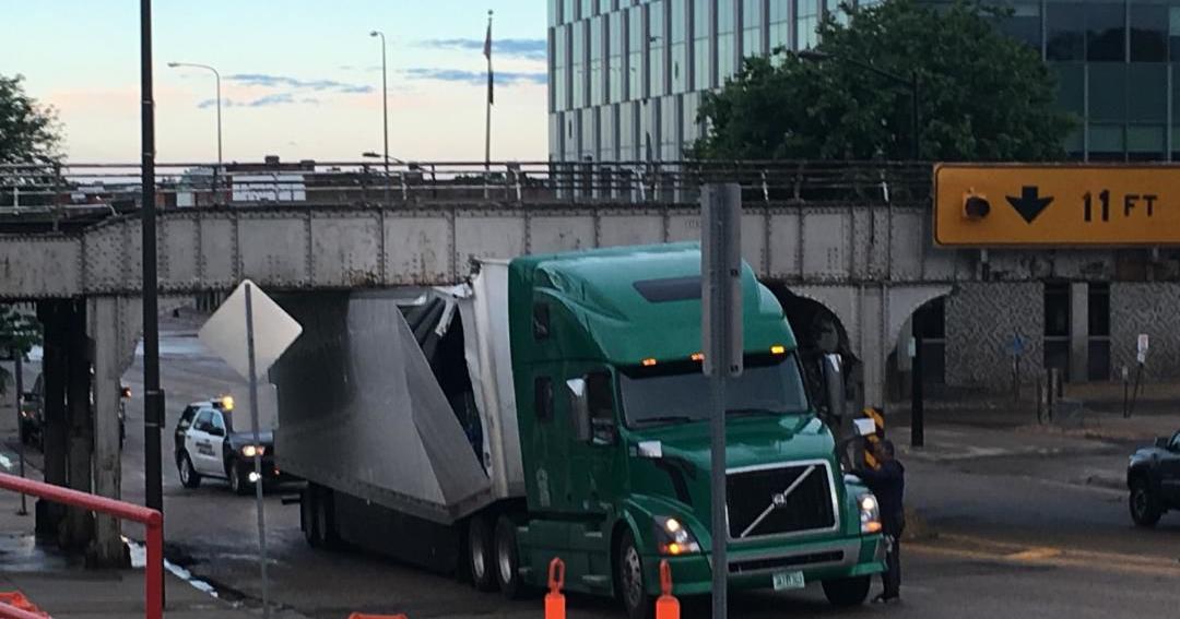 No news: Semi-truck trailer gets stuck under Pierre railroad bridge ...