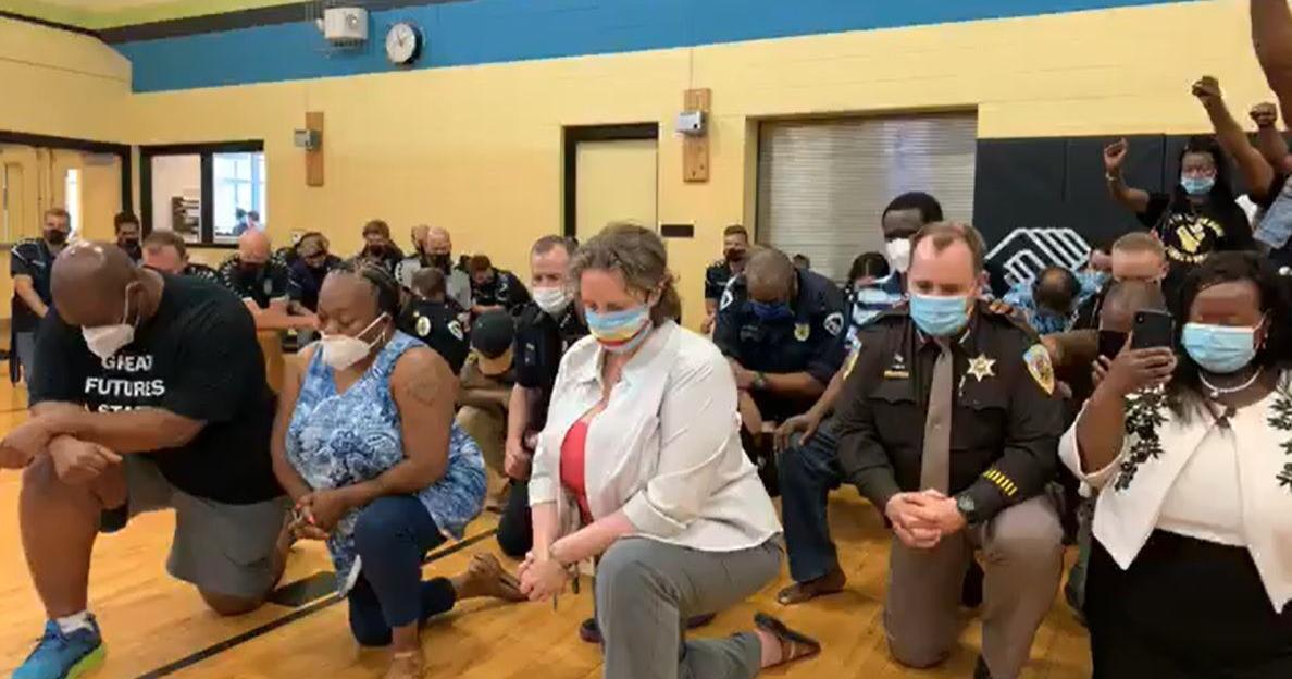 Madison mayor, law enforcement officials kneel in solidarity with black ...