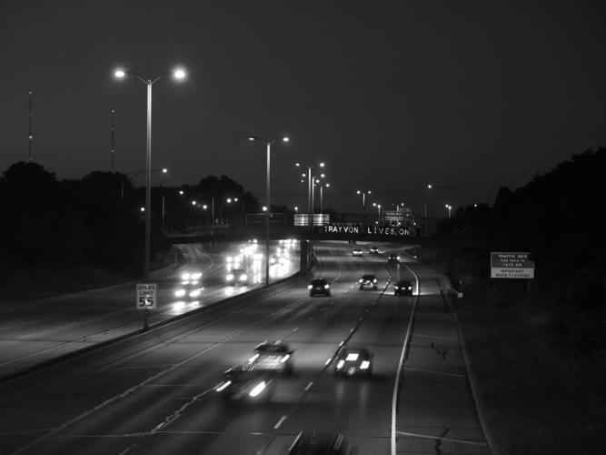 Overpass Light Brigade's illuminated protest signs spark a national ...