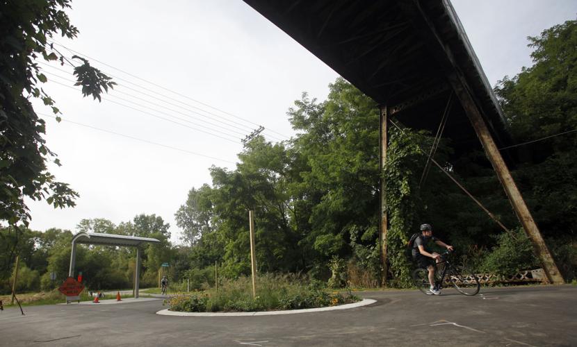 Photos: Bicycle roundabout sits at intersection of 3 bike paths | Local ...