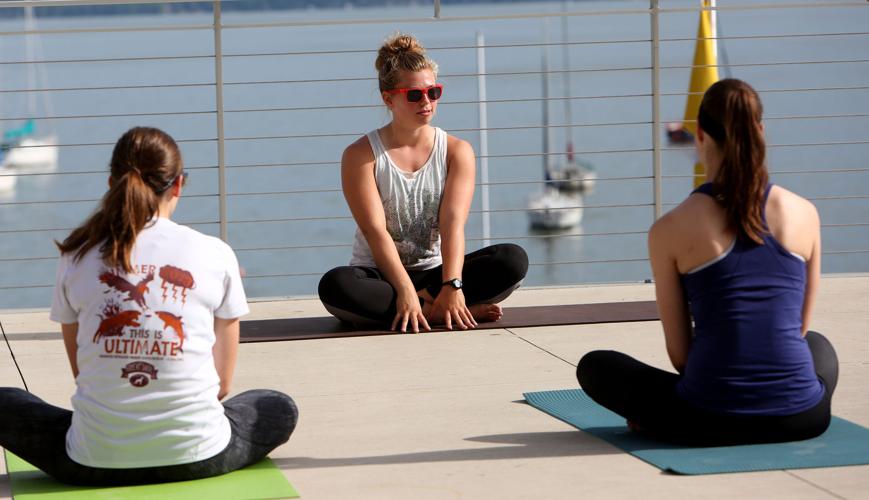 Photos: Terrace Yoga among the sunburst chairs at the Memorial Union ...