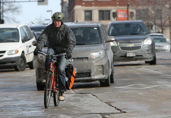 Photos: Braving the cold on a bike | Local News | captimes.com