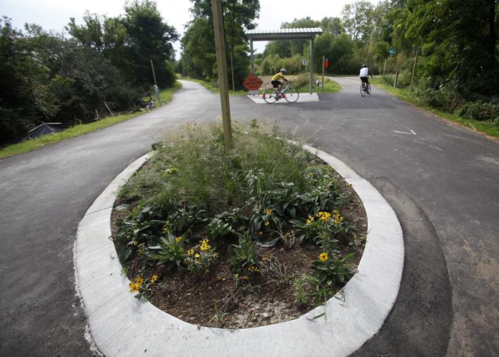 Photos: Bicycle roundabout sits at intersection of 3 bike paths | Local ...