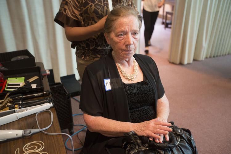 Photos: Latino hairstylists prep clients for breast cancer awareness ...