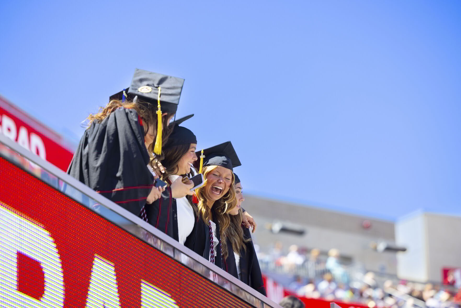 UW-Madison graduation weekend: Blue skies, black caps and red Ws ...