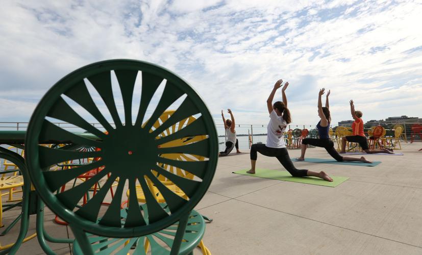 Photos: Terrace Yoga among the sunburst chairs at the Memorial Union ...