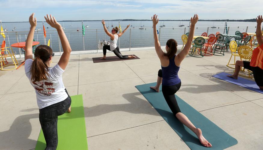 Photos: Terrace Yoga among the sunburst chairs at the Memorial Union ...