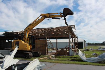 Crews begin demolishing damaged hangars at airport | News ...