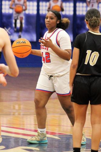 West girls advance to tourney final with 47-29 win over Cougars ...