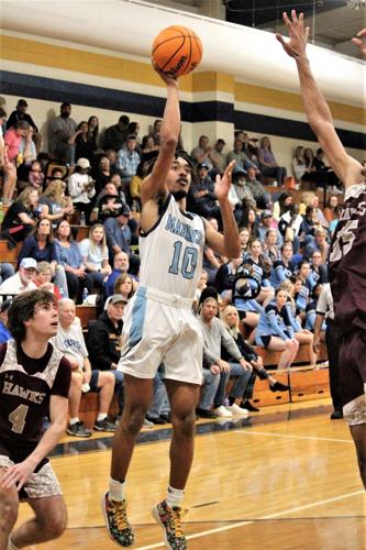 East boys make it to third round again, escape with 61-60 win over ...