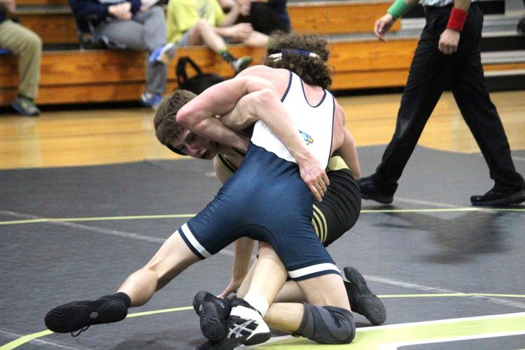 Cougars advance to third round of the dual-team wrestling playoffs ...