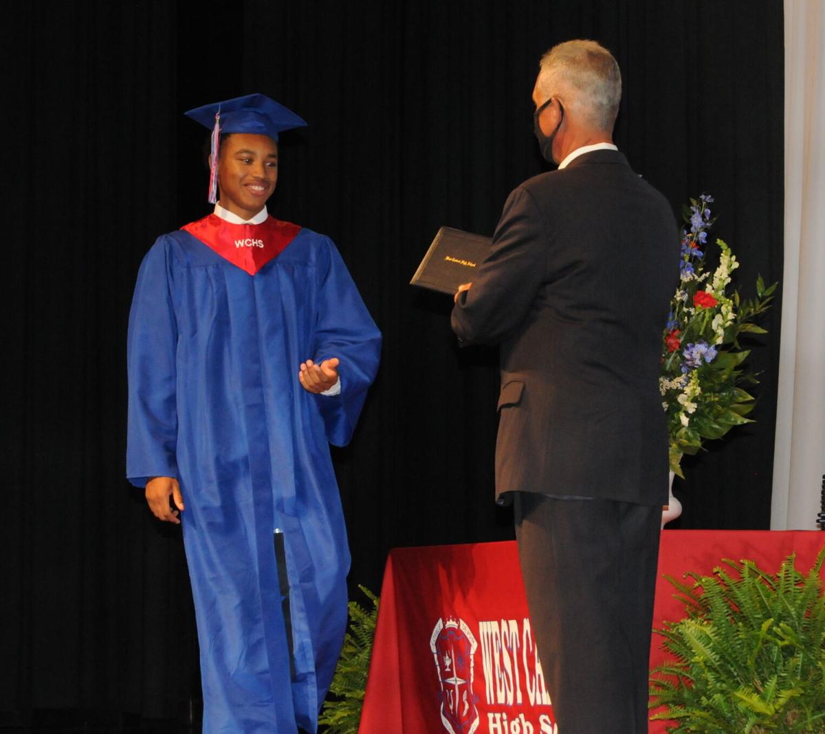 West Carteret awards 240 diplomas in socially distanced graduation ...