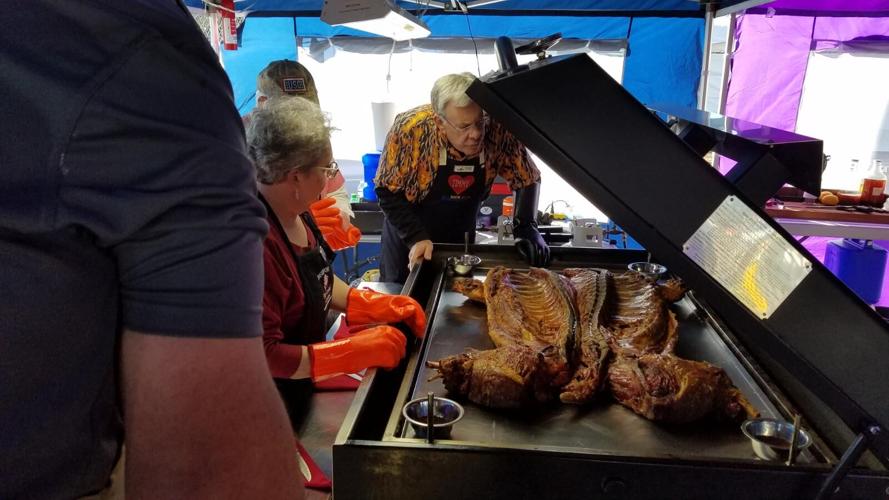 GALLERY: Newport Pig Cooking Contest | Multimedia | carolinacoastonline.com