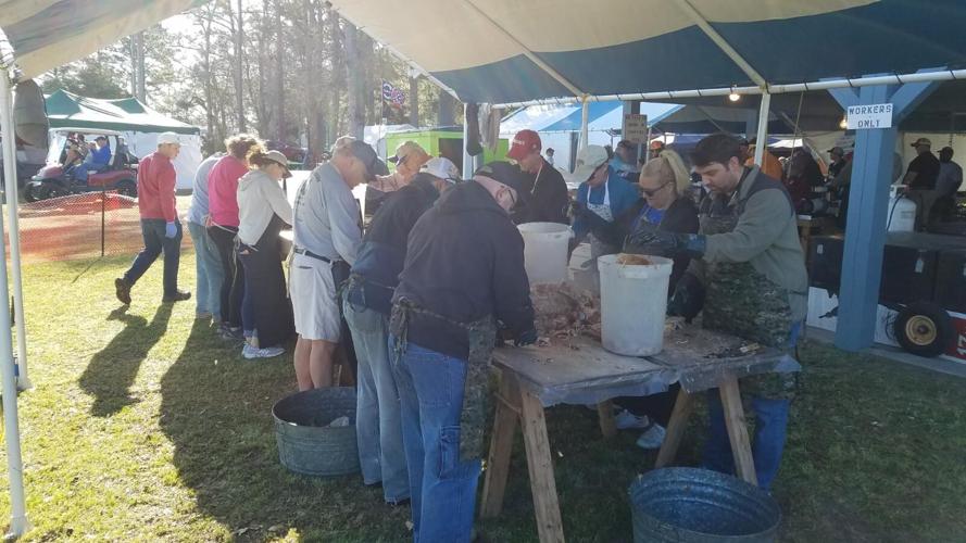 GALLERY: Newport Pig Cooking Contest | Multimedia | carolinacoastonline.com