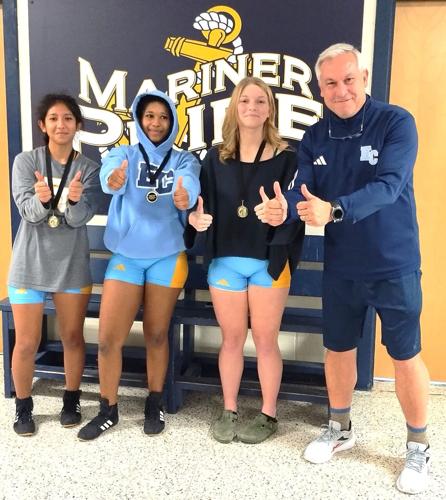East girls place third at CPC wrestling tourney with three Mariners ...