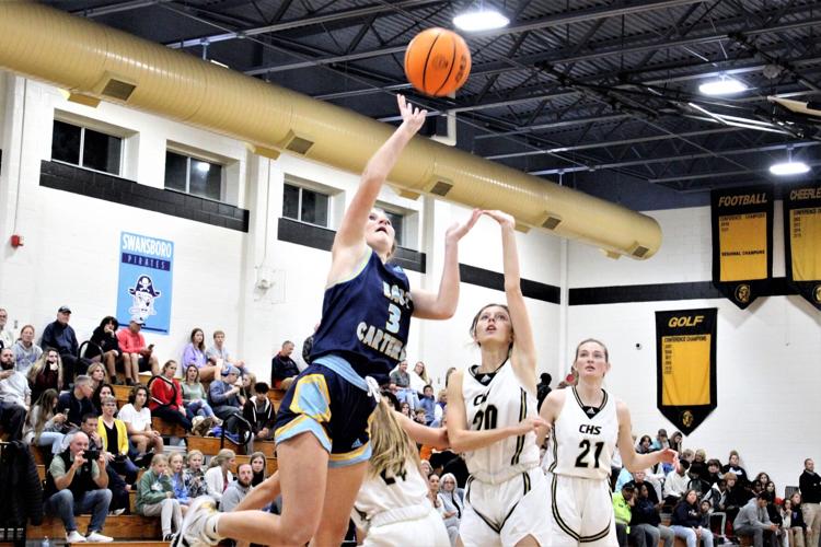 East girls pull away from Cougars for 39-24 victory; Mariners score 12 ...