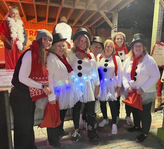 Santas swarm Emerald Isle bars to raise $17,000 for Make-A-Wish | News ...