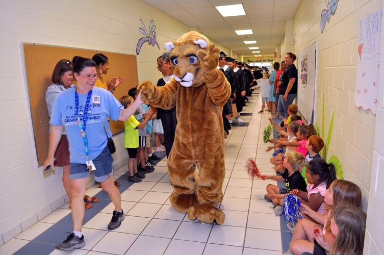 Croatan High School seniors tour schools to inspire younger students to ...