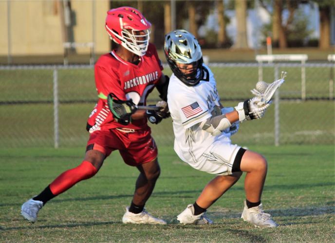 Cougars take 14-8 boys lacrosse victory over Jacksonville after long ...