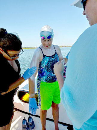 Marathon swimmer takes to Bogue Sound during comeback | Sports ...