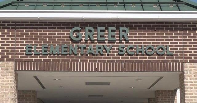 UVA football players trade lecture halls for a visit to Greer ...