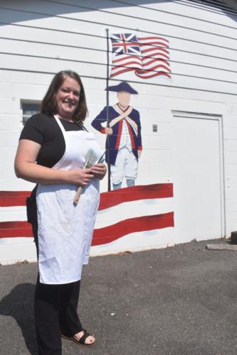 Artist paints military-themed mural on American Legion | Regional ...