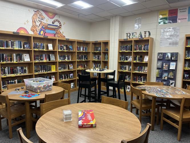 Rising Sun High student shares love of art through library mural ...