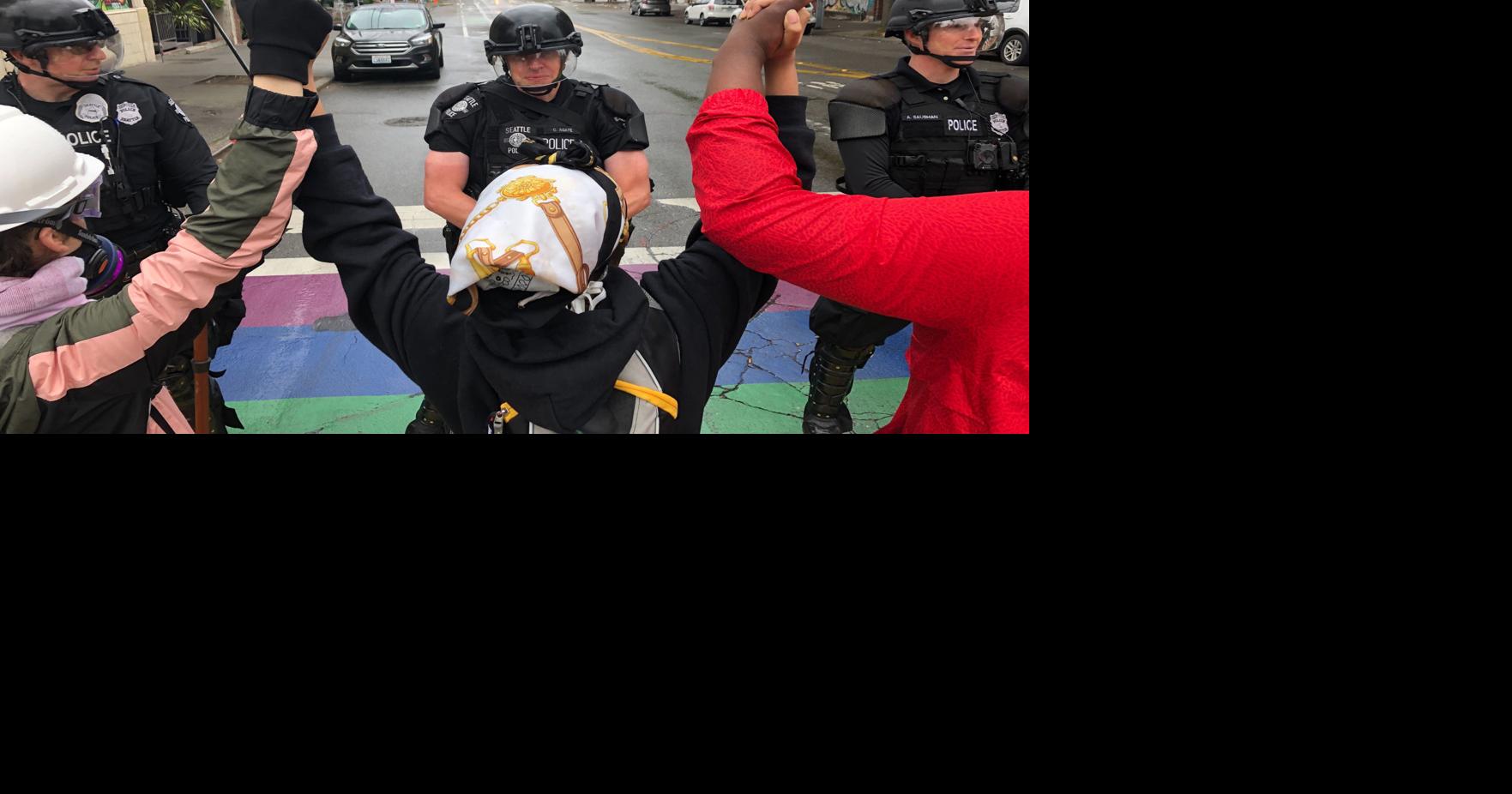 Seattle cops clear 'occupied' zone, more than 20 arrested | News ...