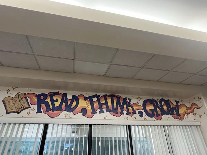 Rising Sun High student shares love of art through library mural ...