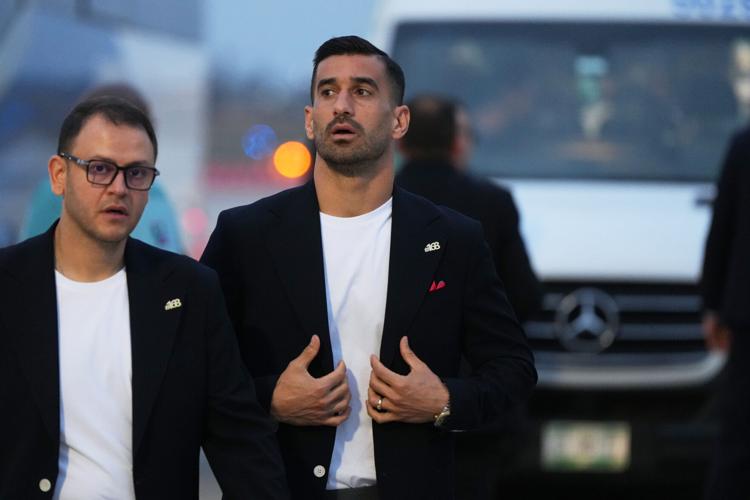 Iran's World Cup players wear pins for victims of deadly strike on ...
