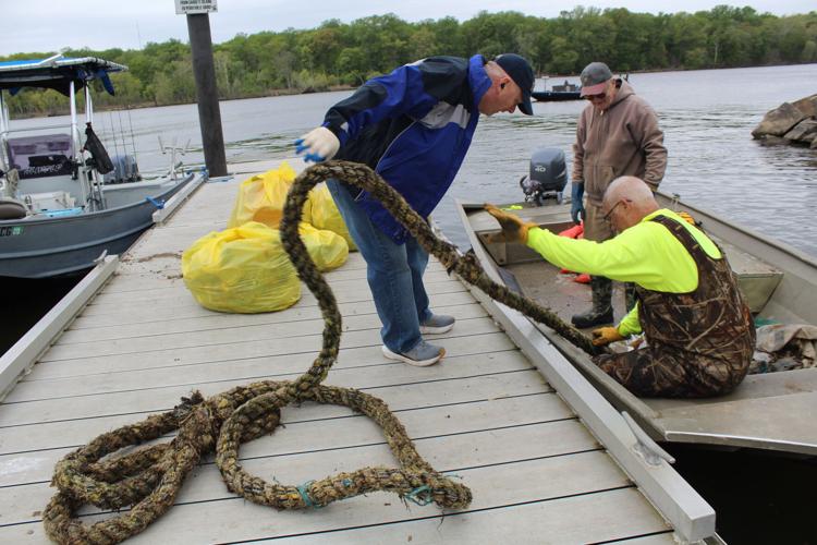 River Sweep volunteers work in the rain and wind | News | cecildaily.com