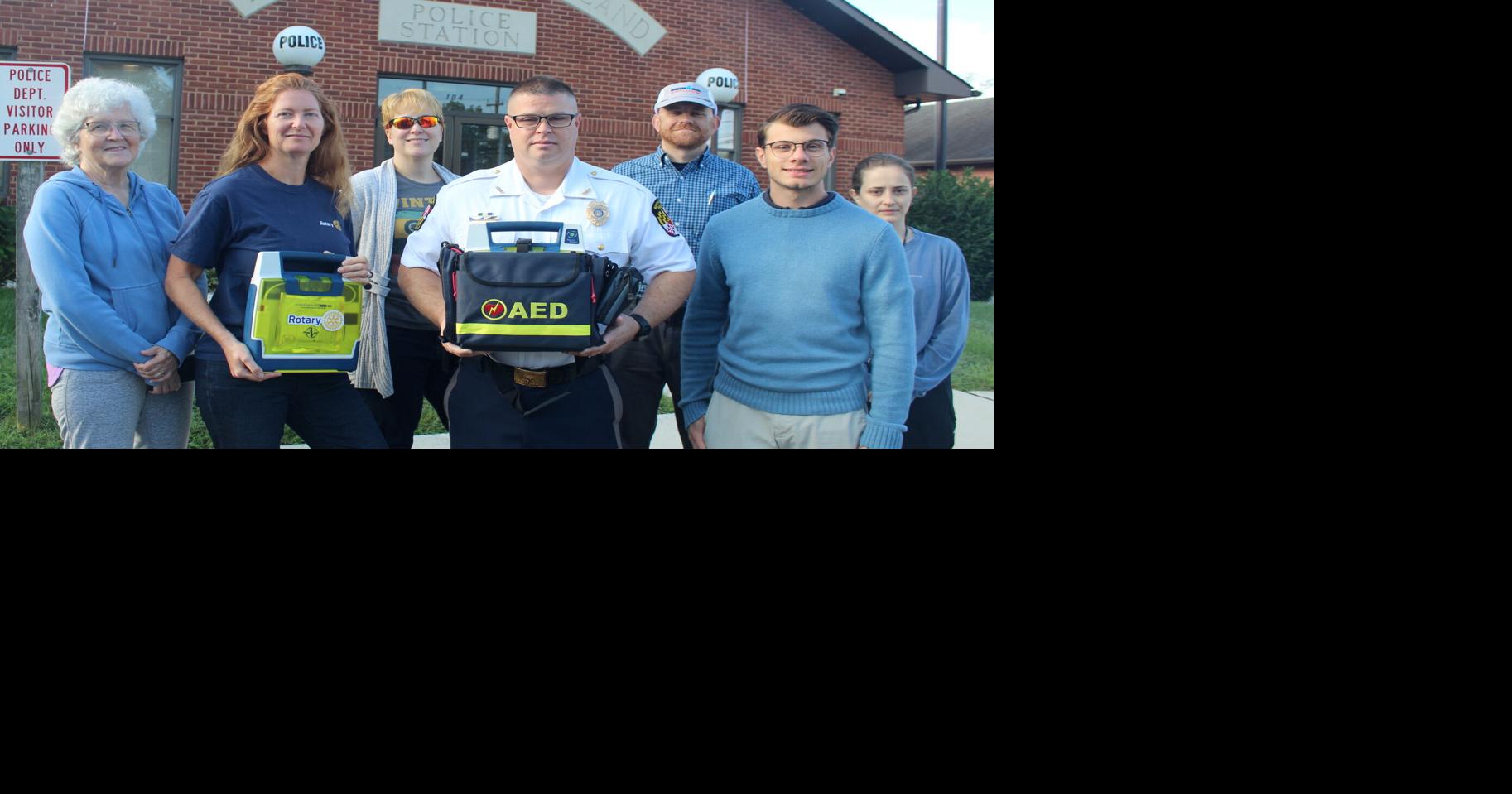 North East Rotary Club donates 12 AEDs to town police | News ...