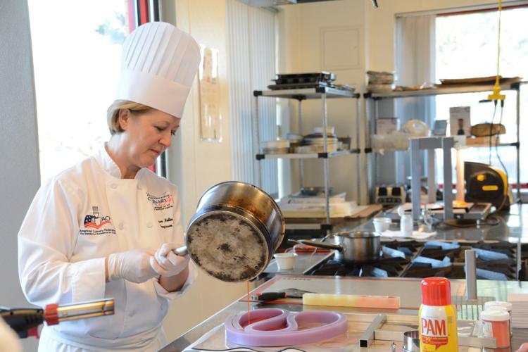 Culinary Olympian sculpts sugar creations during tech school ...
