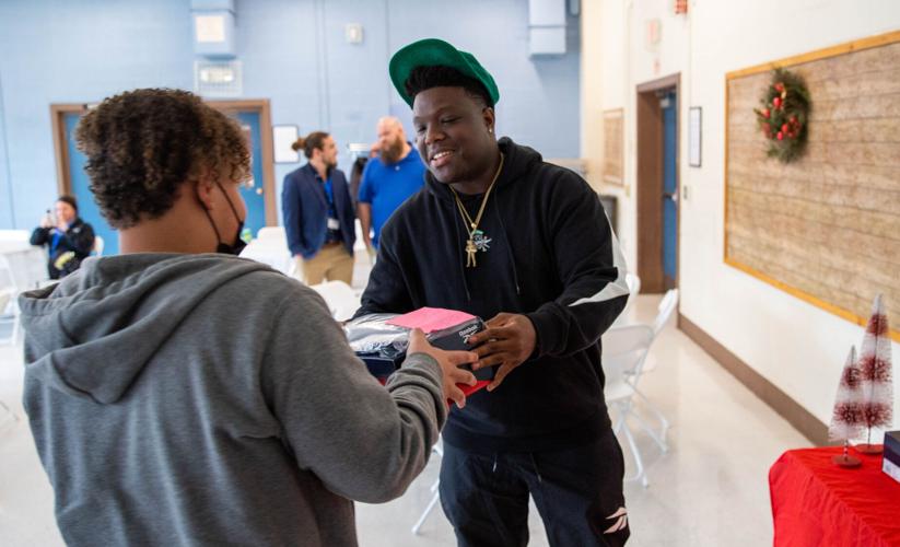 Rapper, High Road alum gifts new shoes to students | News | cecildaily.com