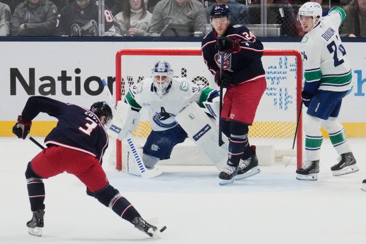 Blue Jackets beat skidding Canucks 4-1 behind Marchenko and Johnson ...