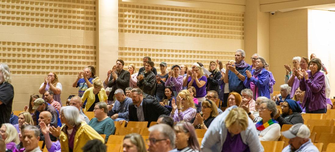 Dozens speak in support of Board of Education member after ...