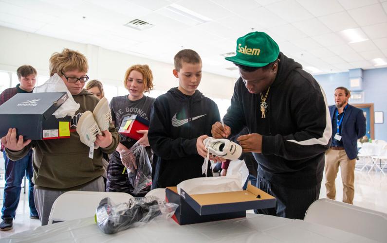 Rapper, High Road alum gifts new shoes to students | News | cecildaily.com