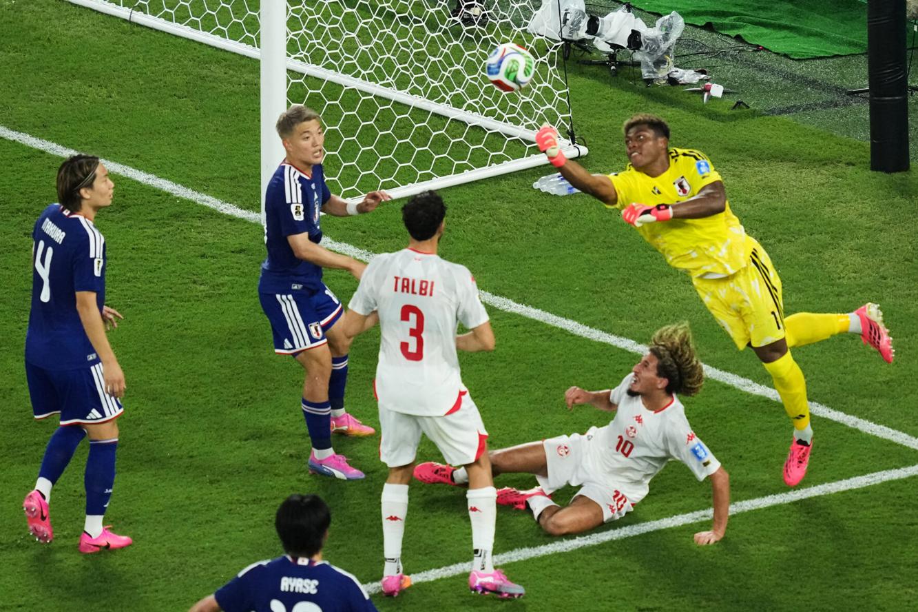 Japan Tunisia WCup Soccer | World Cup | cecildaily.com