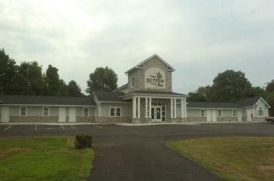 Sutton Inn, local lodging icon, renovated, reopens | Business ...