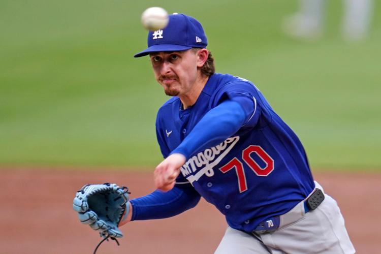 Ohtani homers, leaves game with left knee inflammation in Dodgers' 8-6 ...