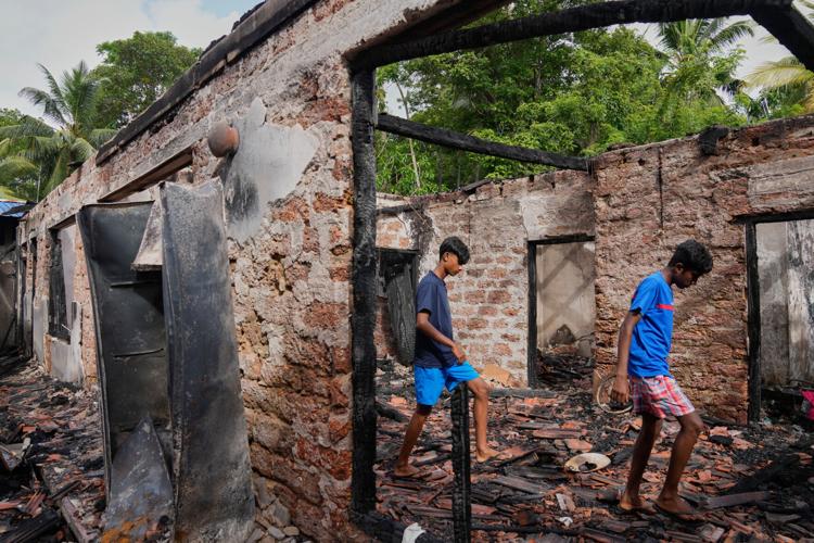 Survivors from a burned Sri Lankan nursing home relocate, in photos ...