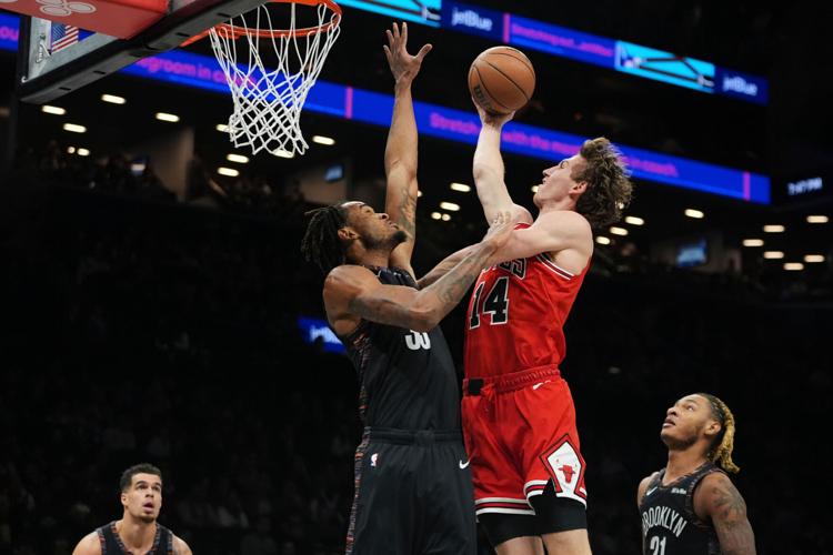 Porter makes go-ahead basket and the Nets beat the Bulls 112-109 to ...