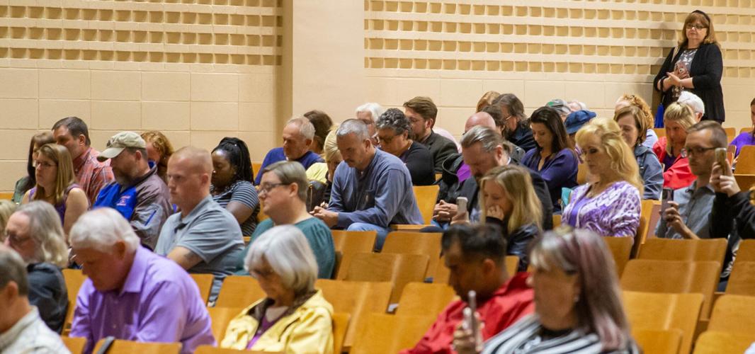 Dozens speak in support of Board of Education member after ...