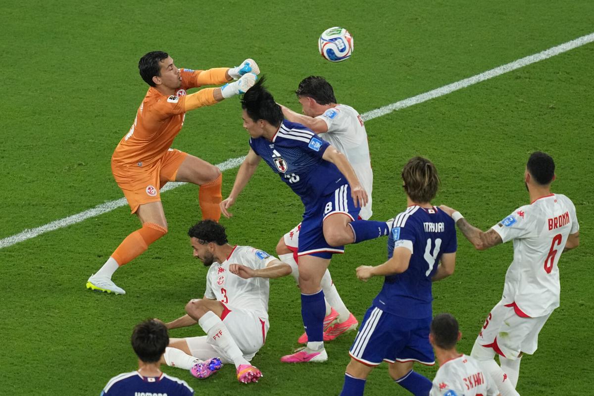 Japan Tunisia WCup Soccer | World Cup | cecildaily.com