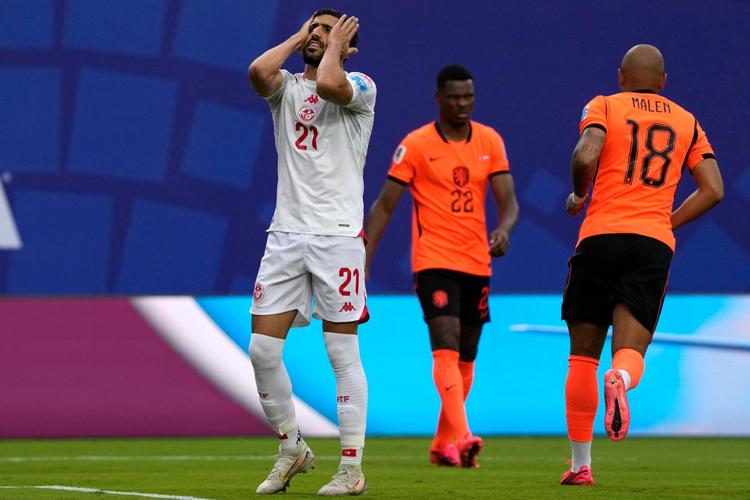 Brian Brobbey and the Dutch roll in the rain to a 3-1 win over Tunisia ...