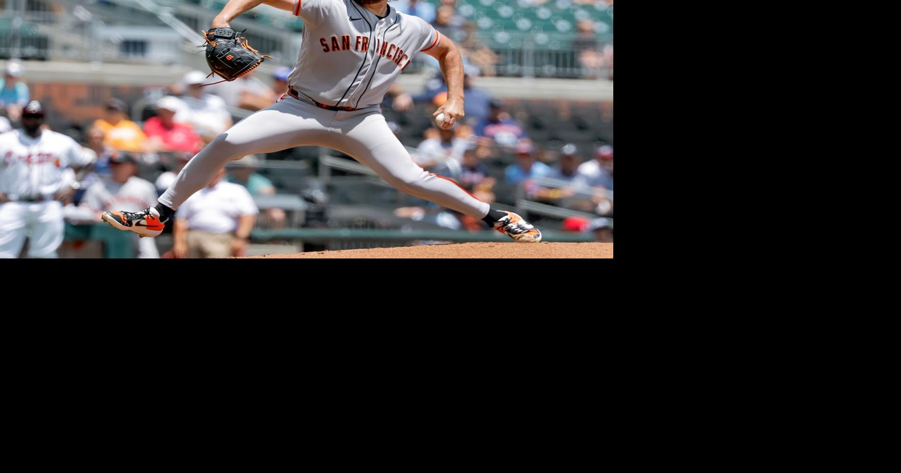 Ray dominant in relief as Giants complete 7-2 win over Braves in Game 1 ...